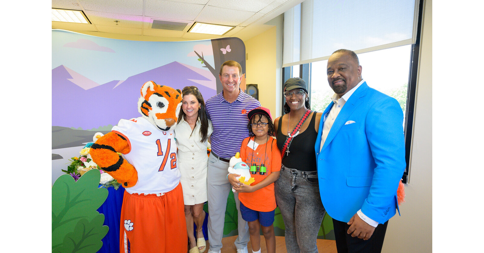 Extending a paw: Coach Dabo Swinney helps deliver My Special Aflac Duck ...